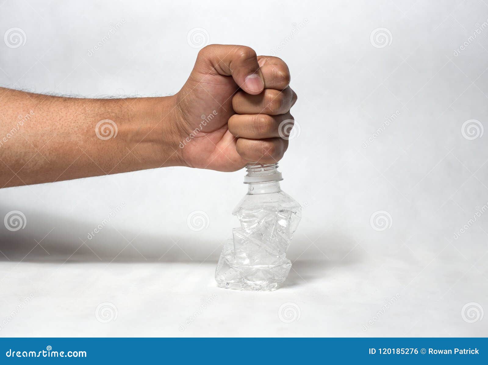 Hand Squashing Empty Plastic Bottle Stock Photo - Image of reuse ...