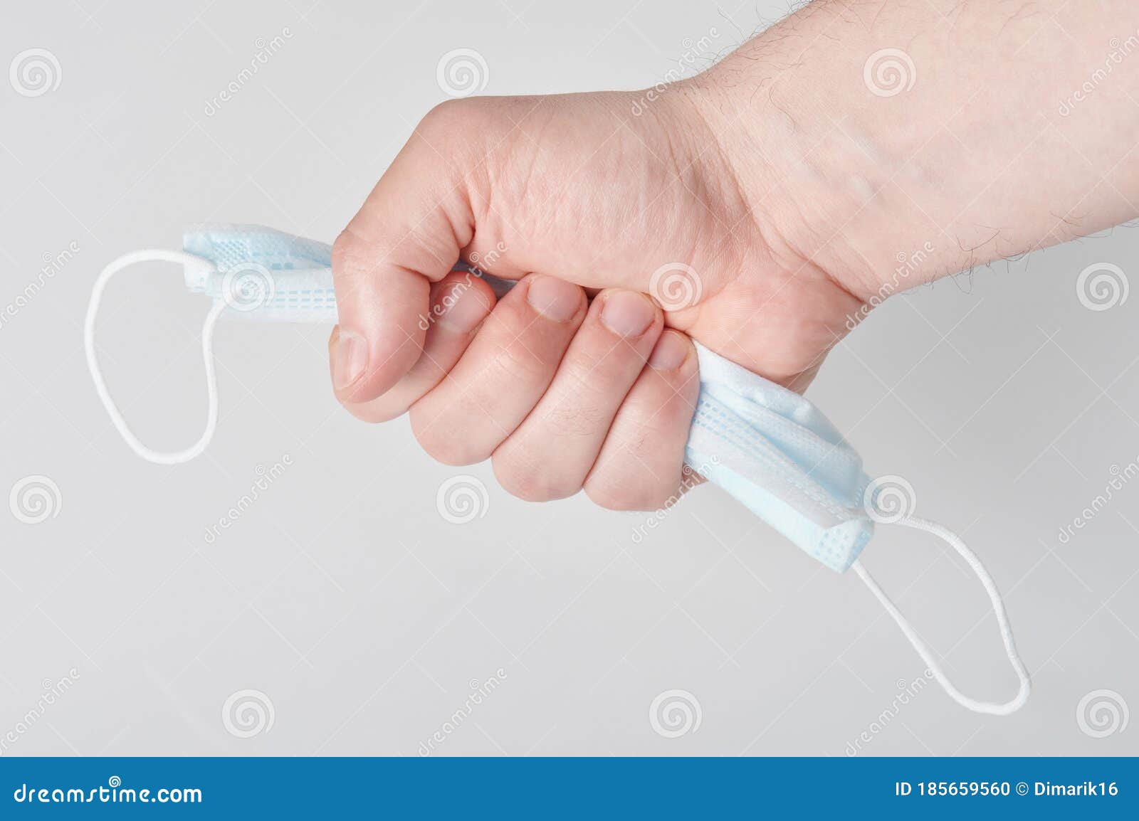 Hand squeeze face mask stock photo. Image of hold, hand - 185659560