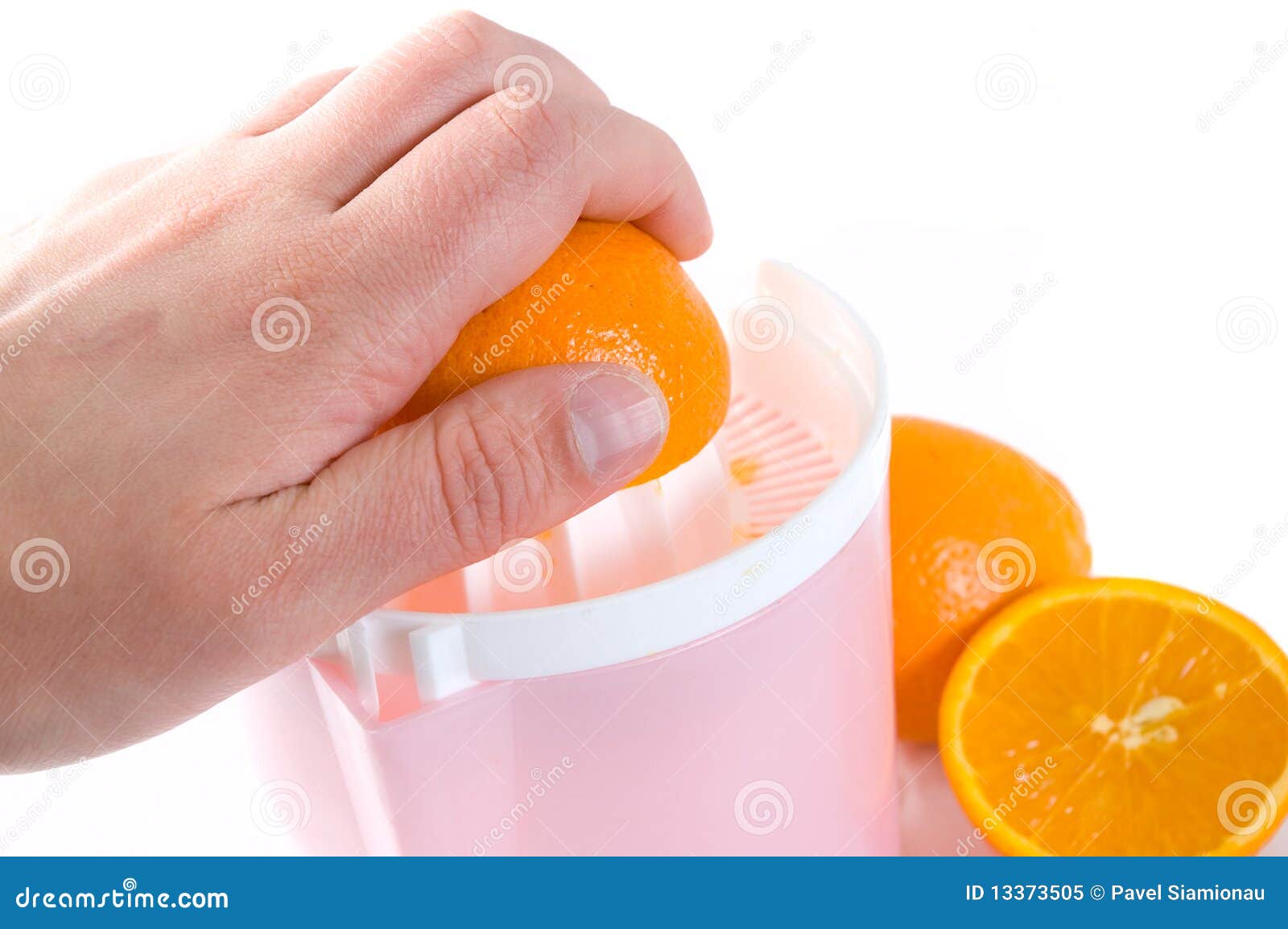 Hand squeezes orange juice stock image. Image of fruit - 13373505