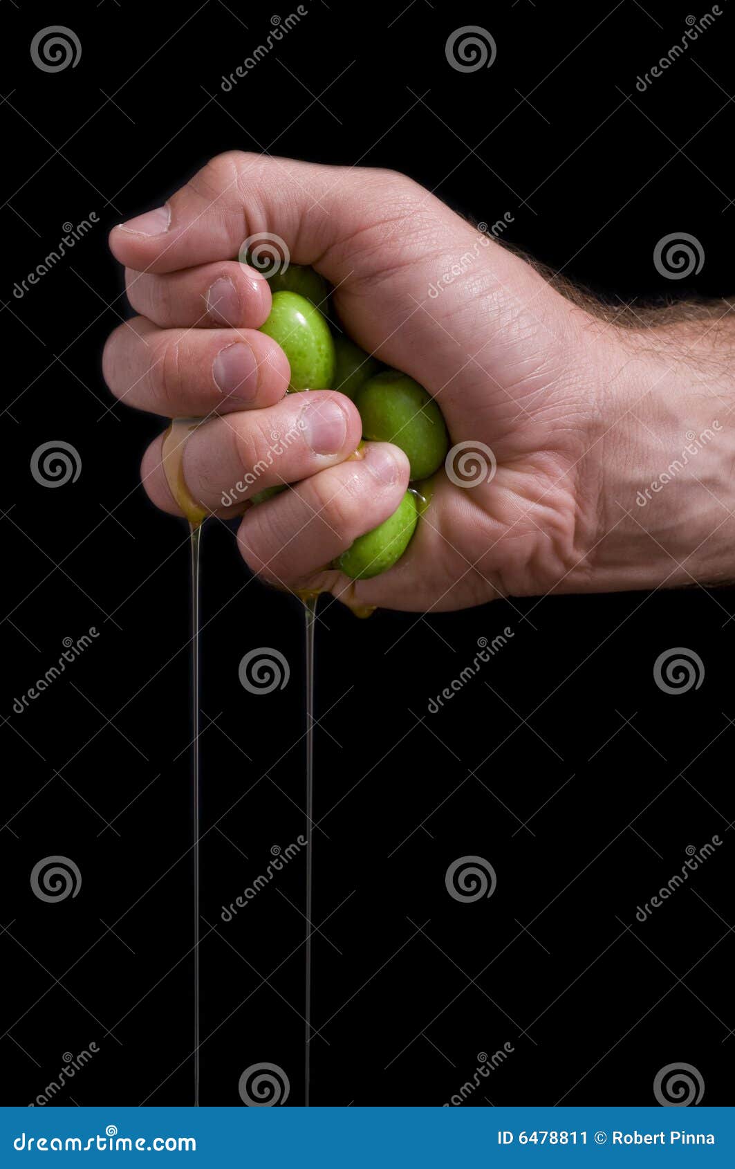 Hand Of Man Squeezing Juice From Sugar Cane. Using Manual Mechanism For ...