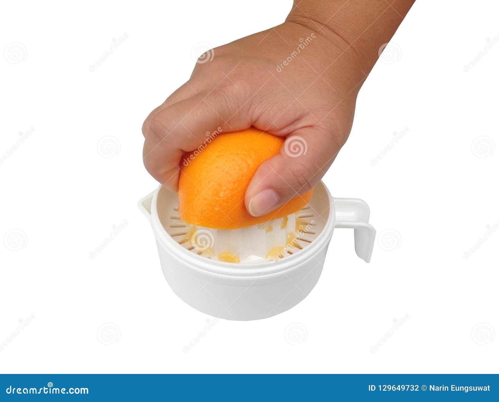 Hand Squeezing an Orange with a Fruit Squeezer Isolated on White ...