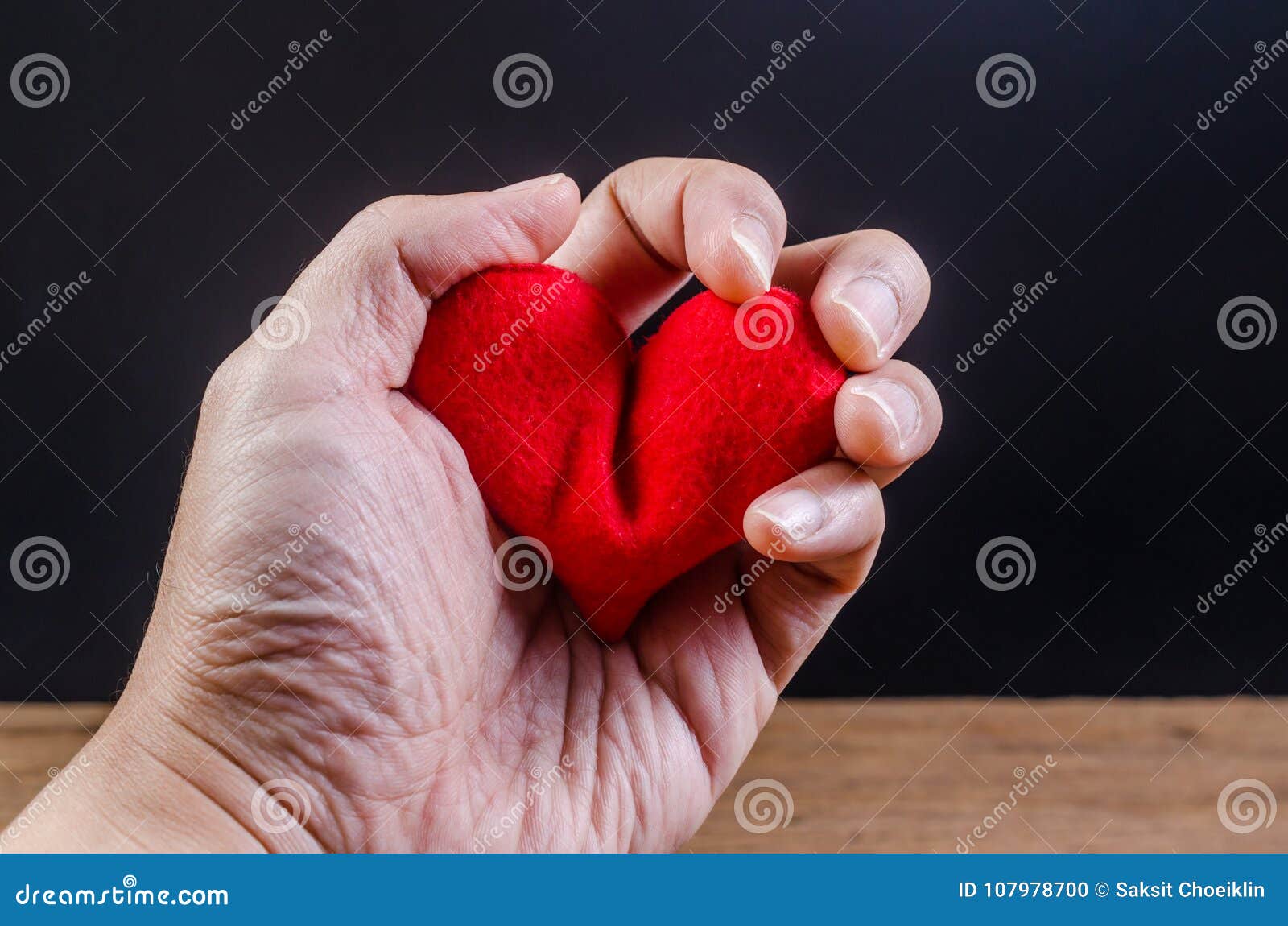 Hand Squeezing Red Heart ,heart Attack , Love Problem Concept Stock ...