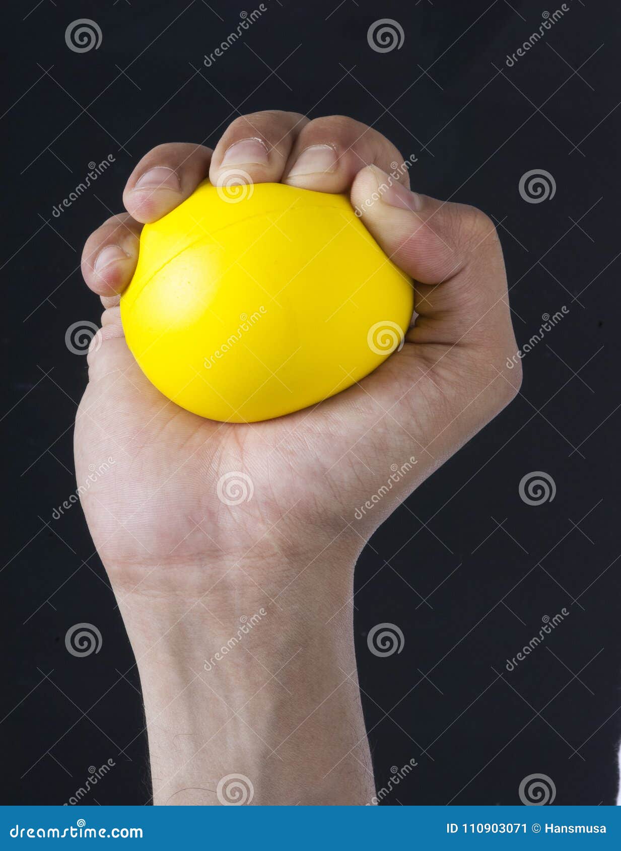 Hand Squeezing Stress Ball stock image. Image of male - 110903071