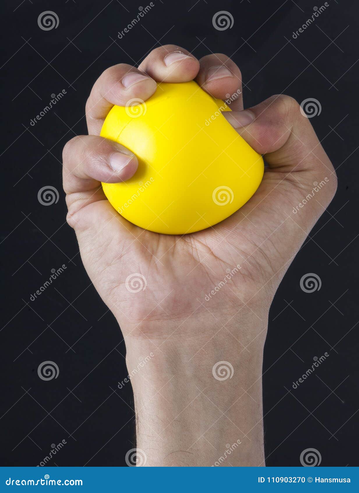 Hand Squeezing Stress Ball stock photo. Image of energy - 110903270