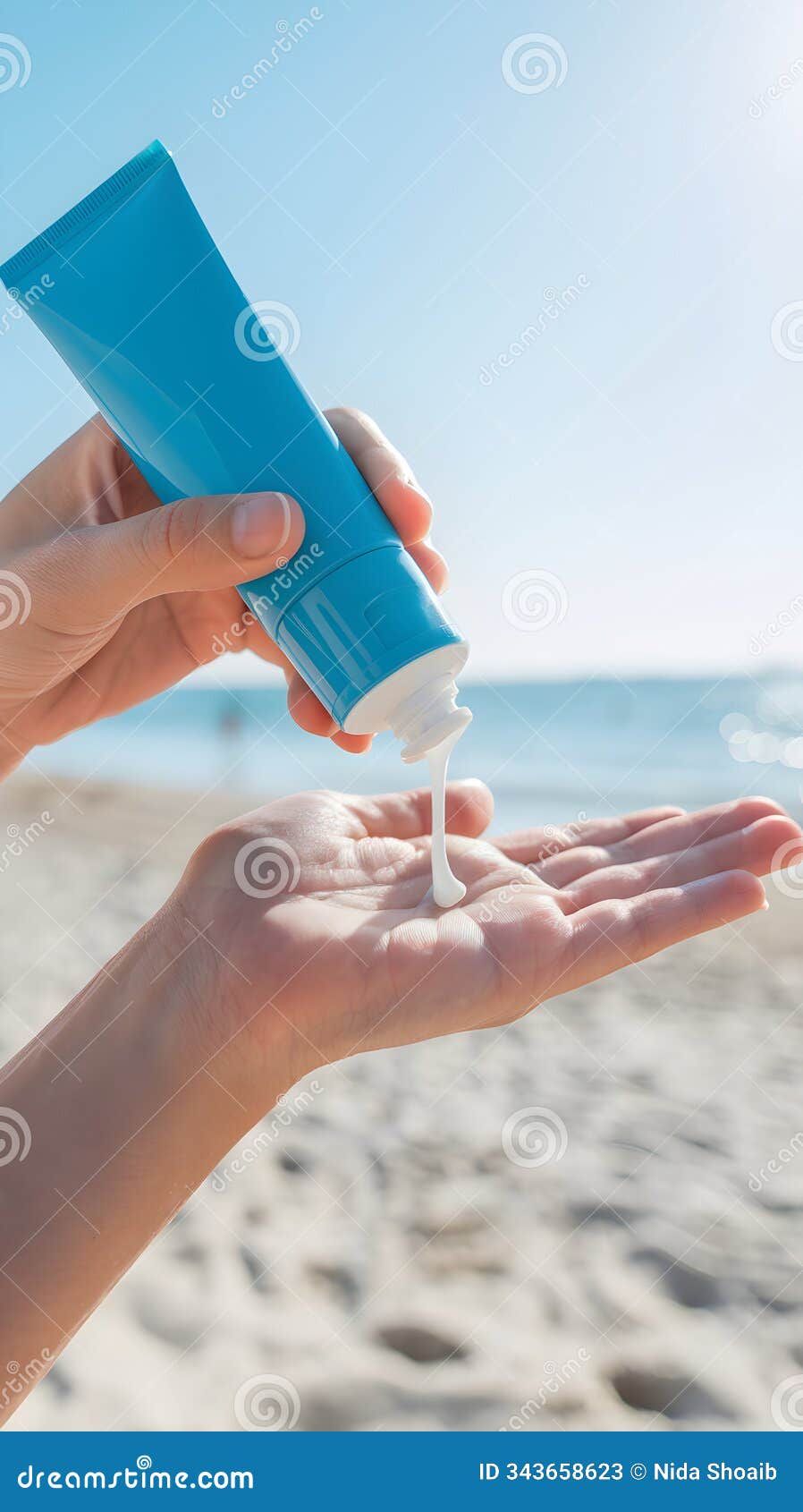 Hand Squeezing Sunscreen with Beach Backdrop Promoting Sun Safety ...