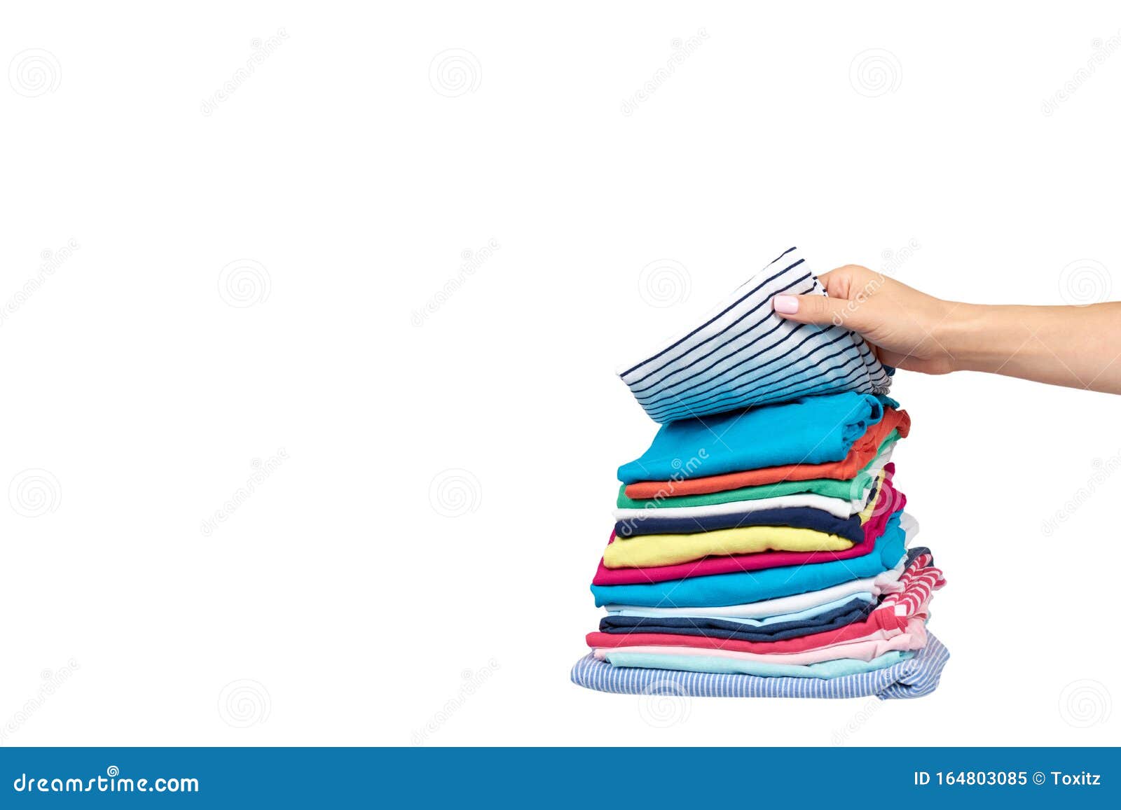 Hand with Stack of Clothes, Fresh Laundry Textile. Isolated Stock Image ...