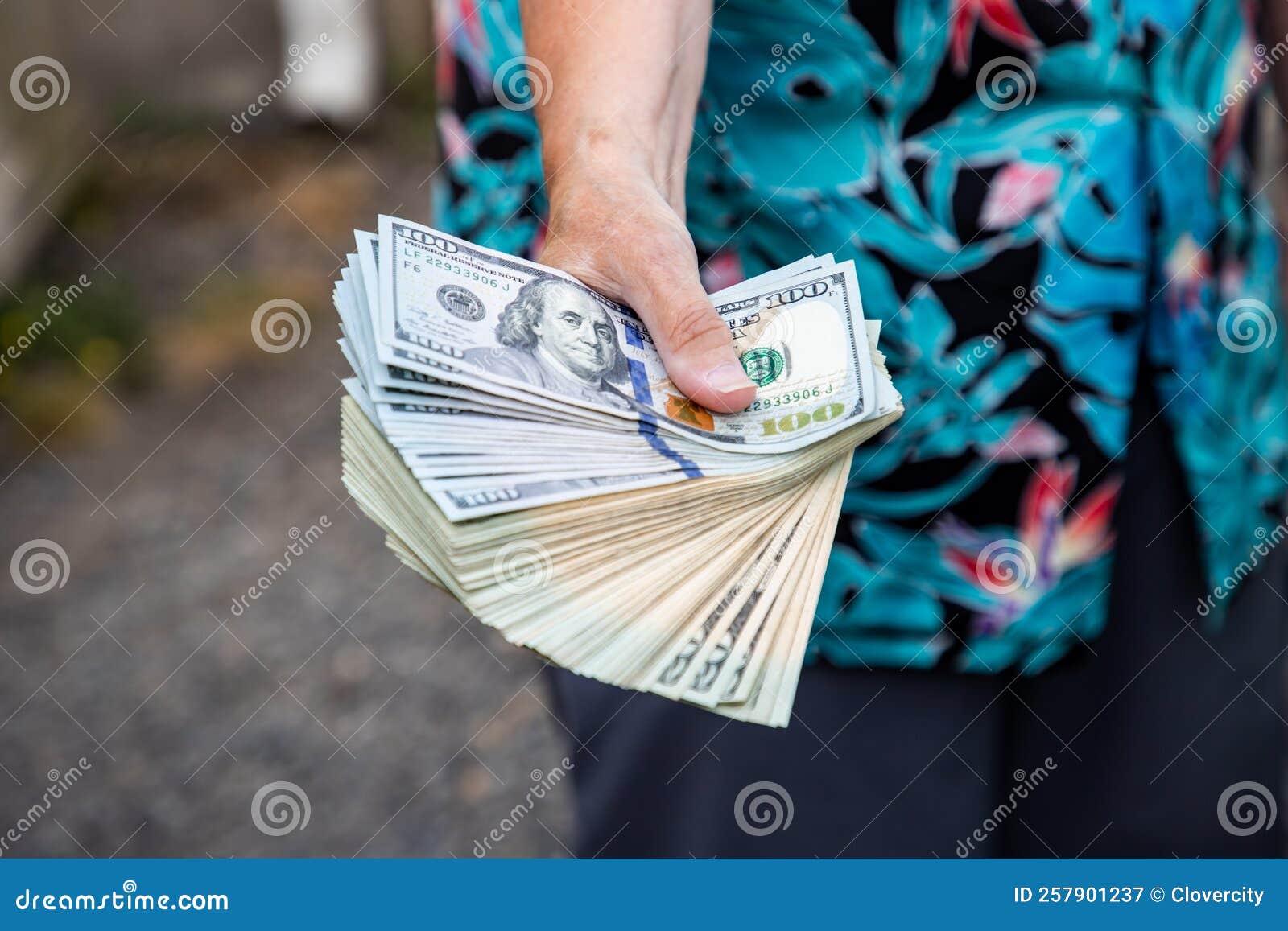 Hand with stack of money stock image. Image of currency - 257901237