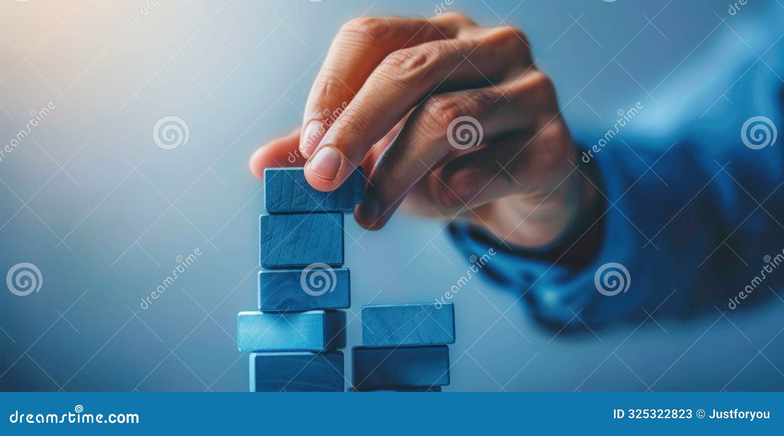 Hand Stacking Blue Blocks in Strategic Build. Generative Ai Stock ...