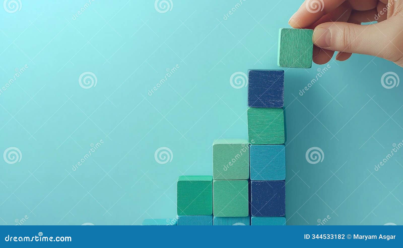 Hand Stacking Colorful Blocks To Create a Bar Graph, Business Concept ... Hand Stacking Colorful Blocks To Create a Bar Graph, Business Concept ...