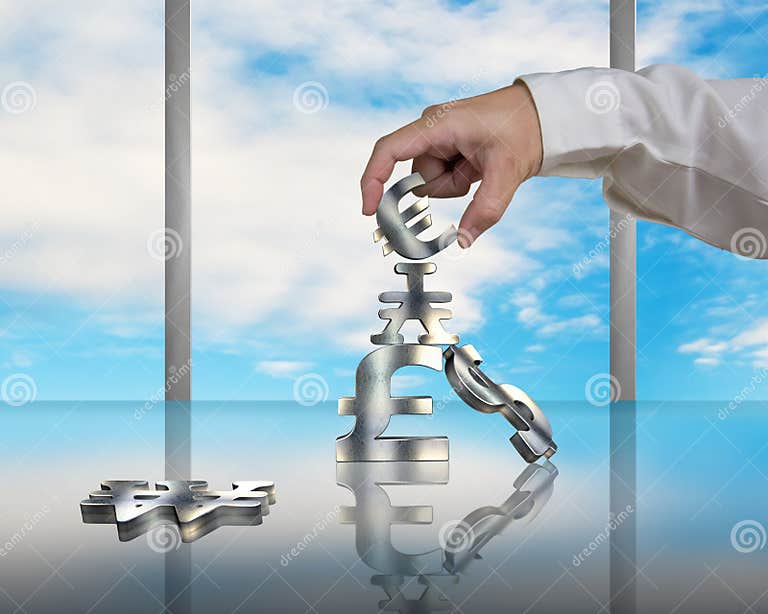 Hand Stacking Money Symbols on Table with Reflection and Sky Stock ...