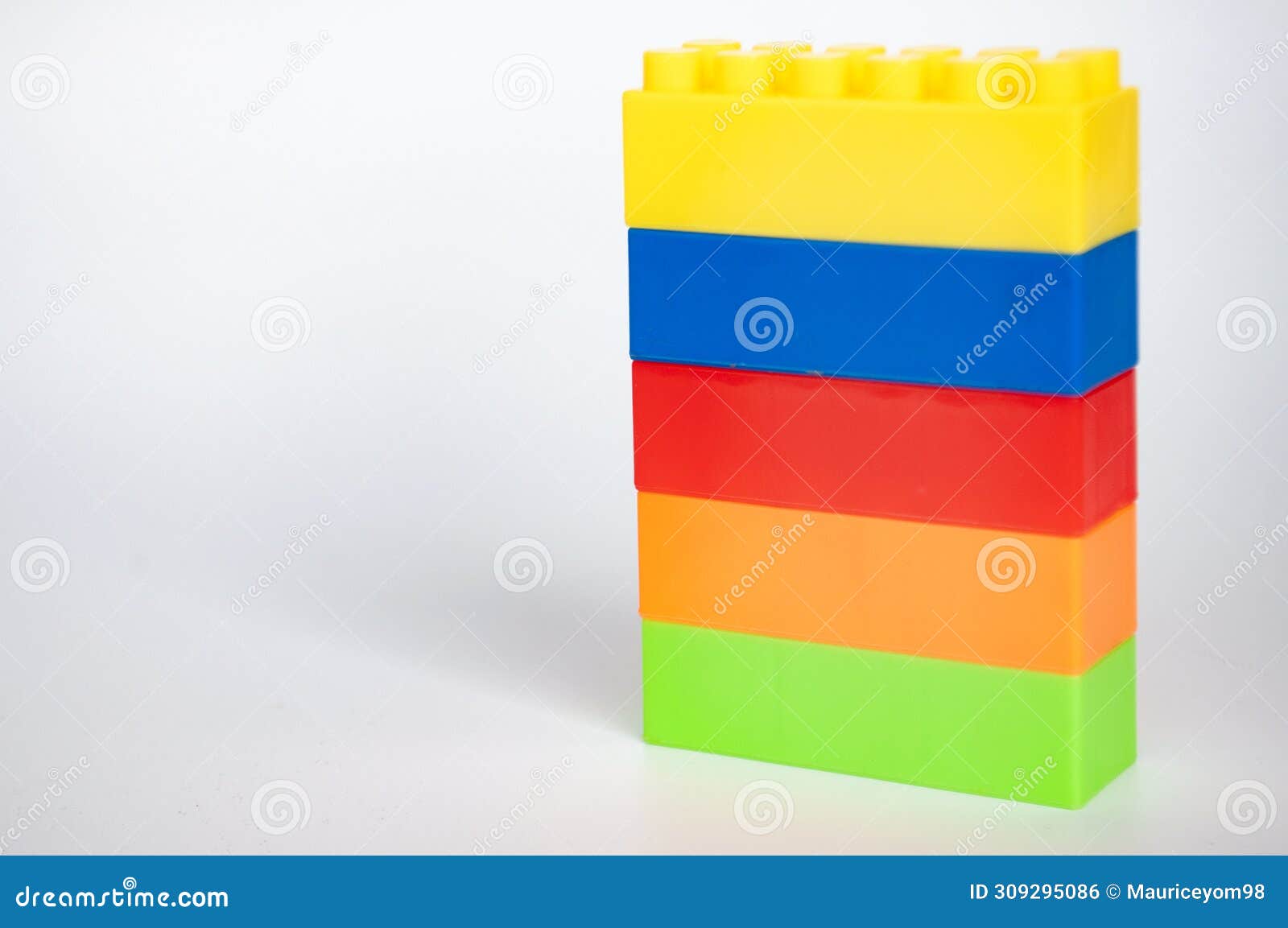 Hand Stacking Up Lego Set with Customizable Space for Text Stock Photo ...
