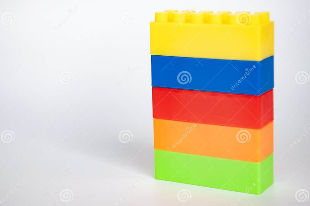 Hand Stacking Up Lego Set with Customizable Space for Text Stock Photo ...