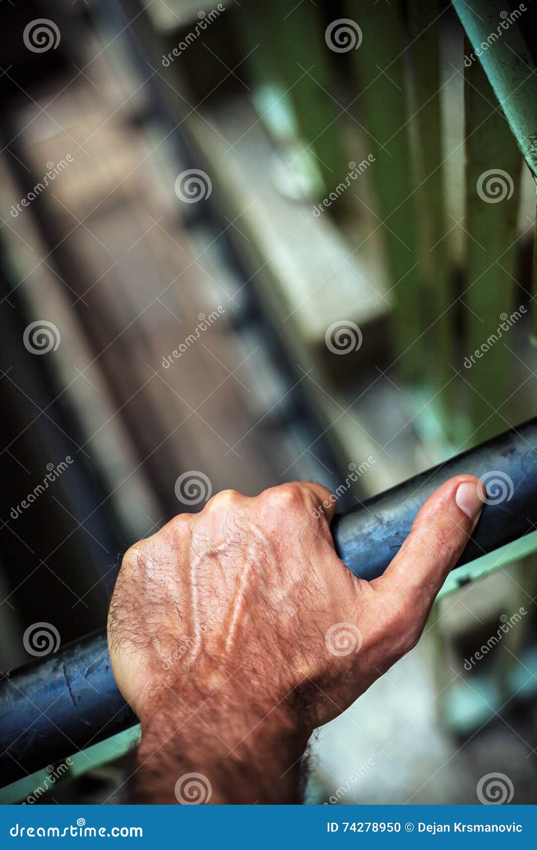 Hand on Staircase Gate stock photo. Image of concept - 74278950
