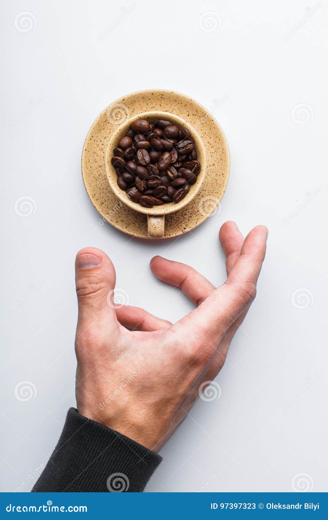 Hand Stretching To a Cup of Coffee on a White Background, Poured Stock ...