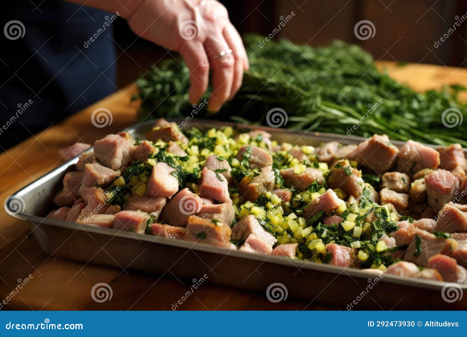 Hand Stuffing Herb Mixture into Pork Belly Stock Photo - Image of ...