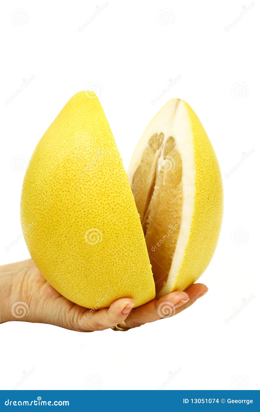 Hand Supporting a Pomelo Fruit Cut in Half Stock Photo - Image of white ...