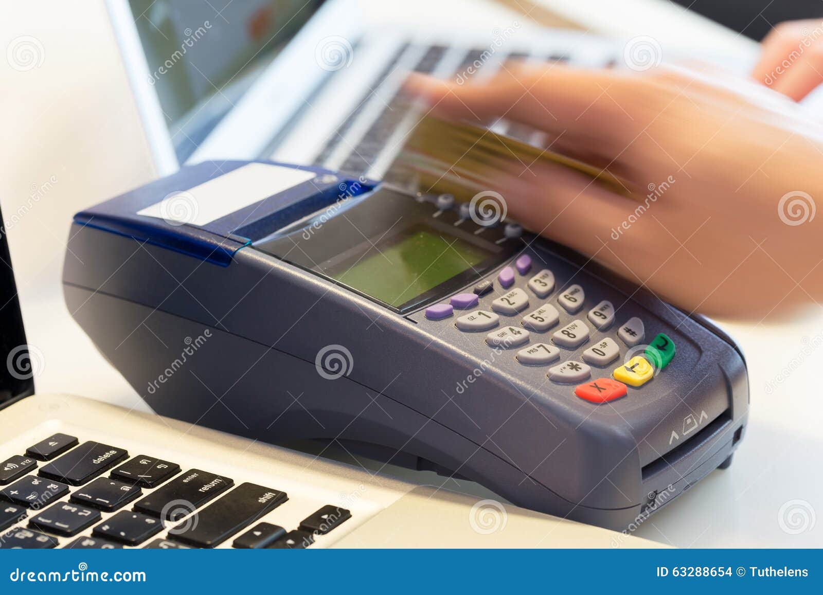 Hand Swiping Credit Card stock photo. Image of device - 63288654