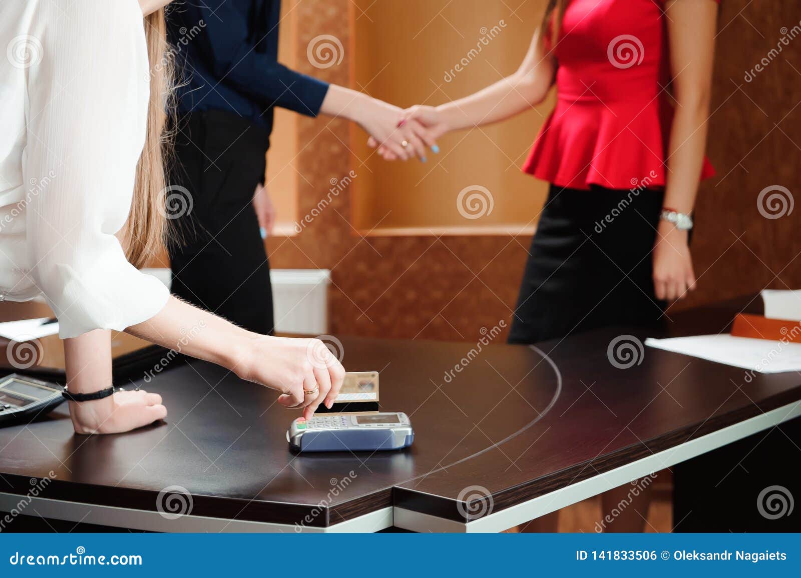 Hand Swiping Debit Card on Pos Terminal, People in Office Holding a ... Hand Swiping Debit Card on Pos Terminal, People in Office Holding a ...