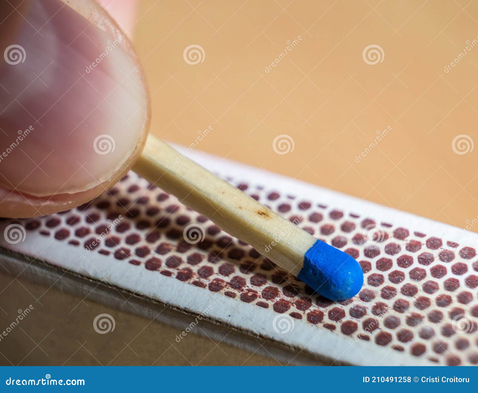 Hand Swiping a Matchsticks from the Striking Surface of the Matchbox ...
