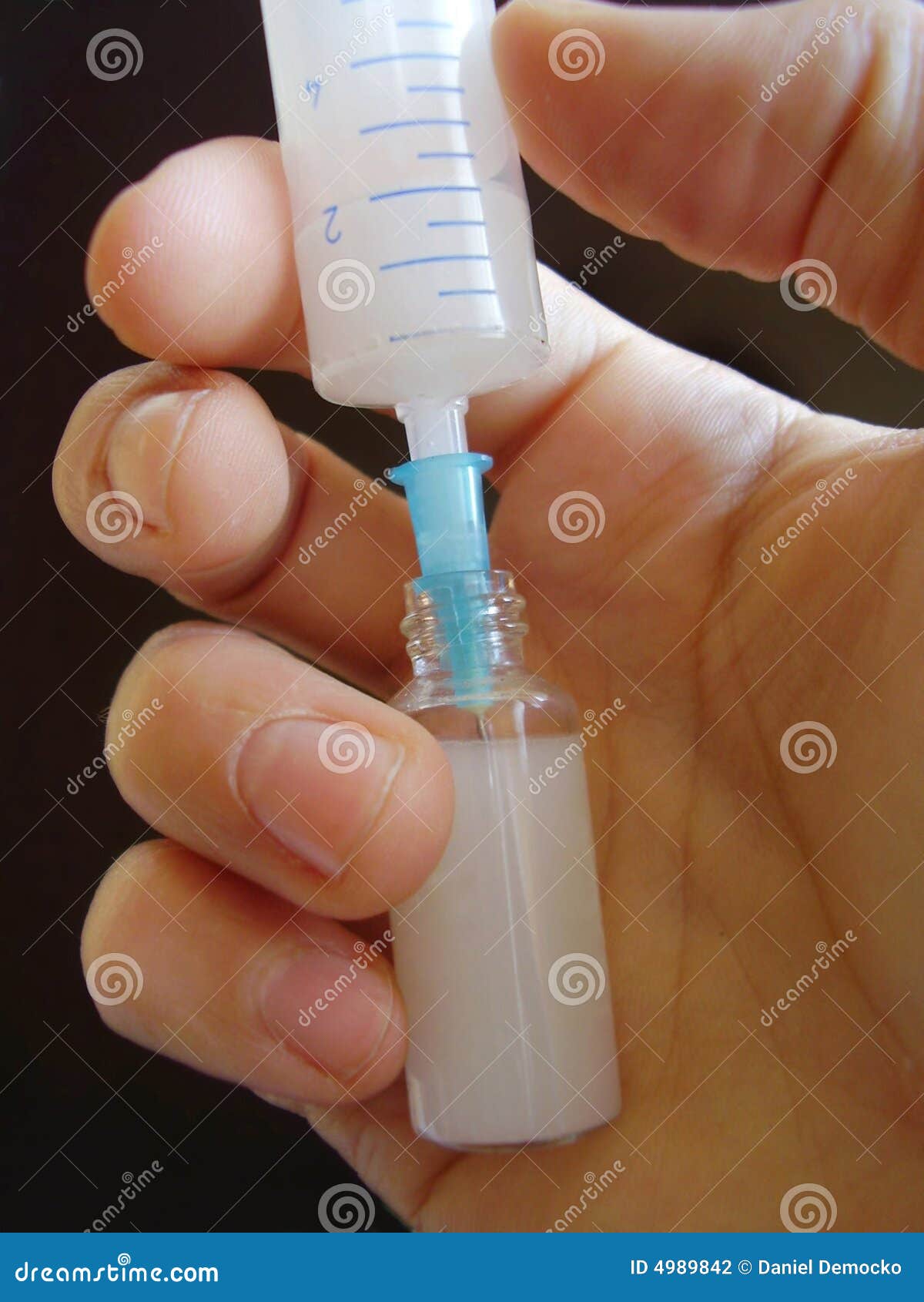 Hand with syringe stock photo. Image of syringe, solution - 4989842