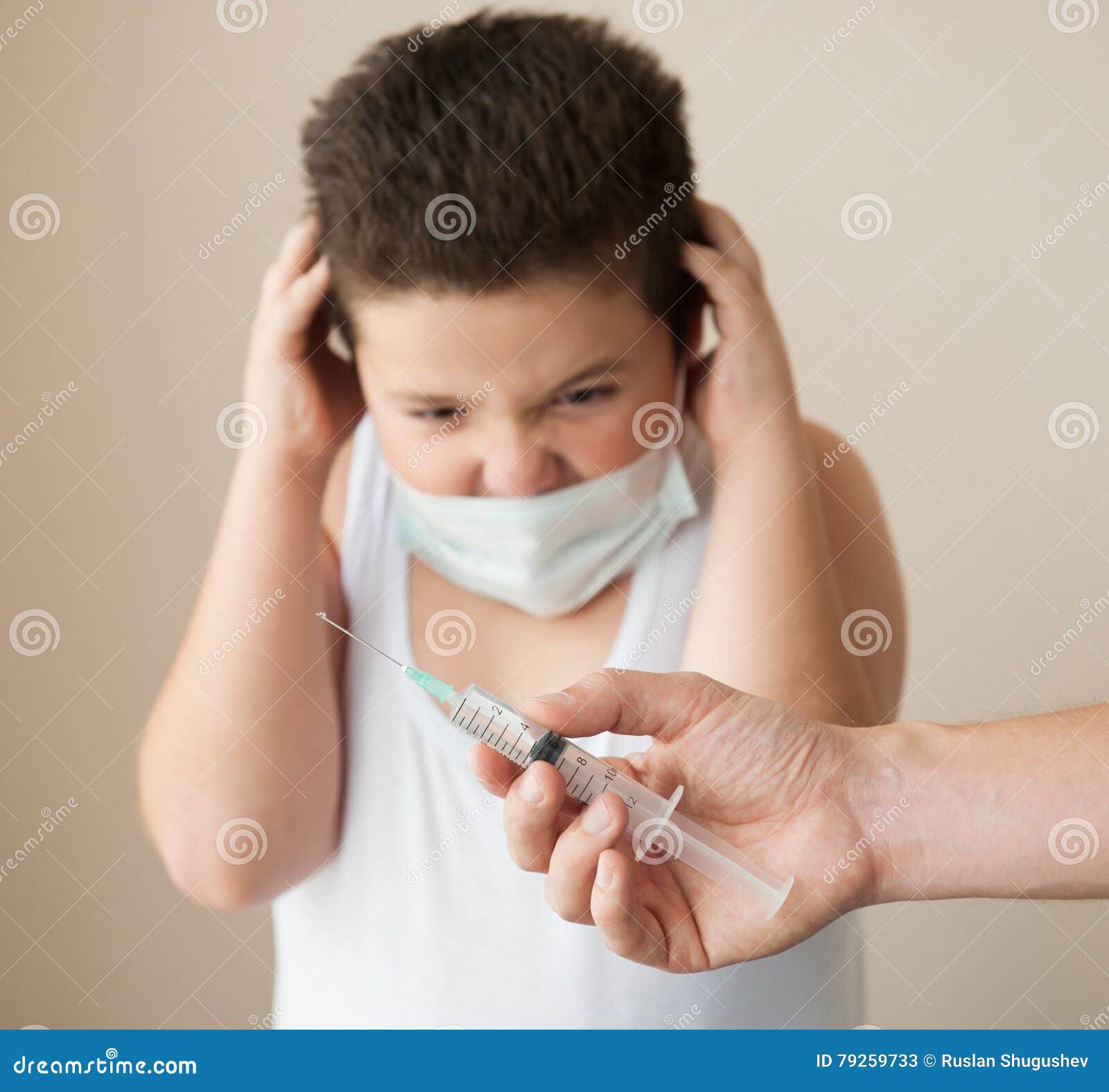 Hand with Syringe in Front of a Thick Scared Boy in the Medical Mask ...