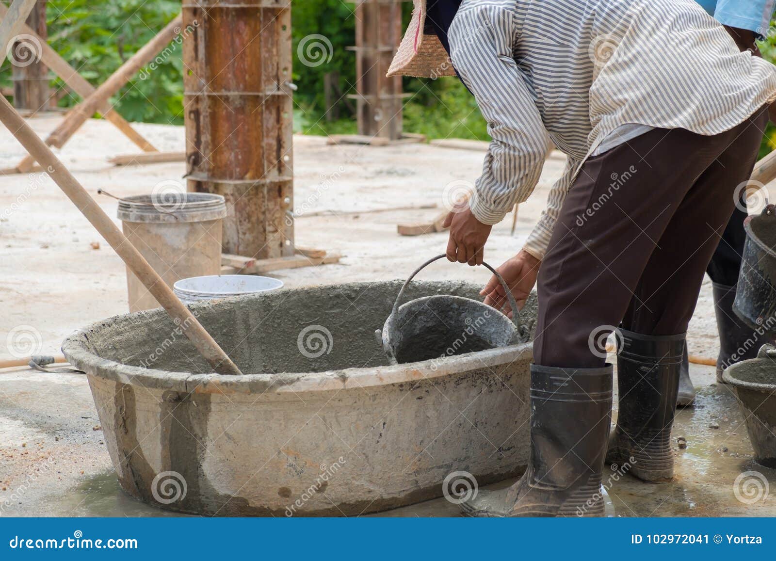 Hand take a concrete mix stock image. Image of home - 102972041