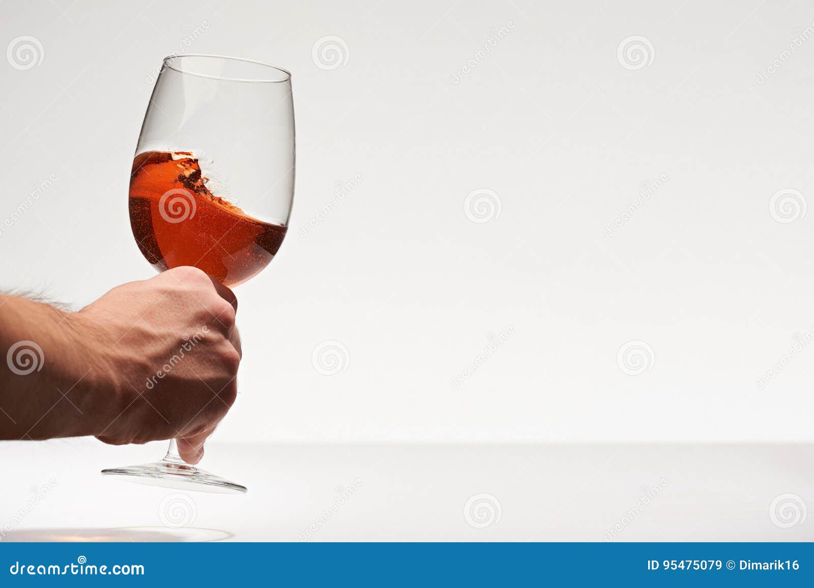 Hand take red wine glass stock image. Image of drink - 95475079