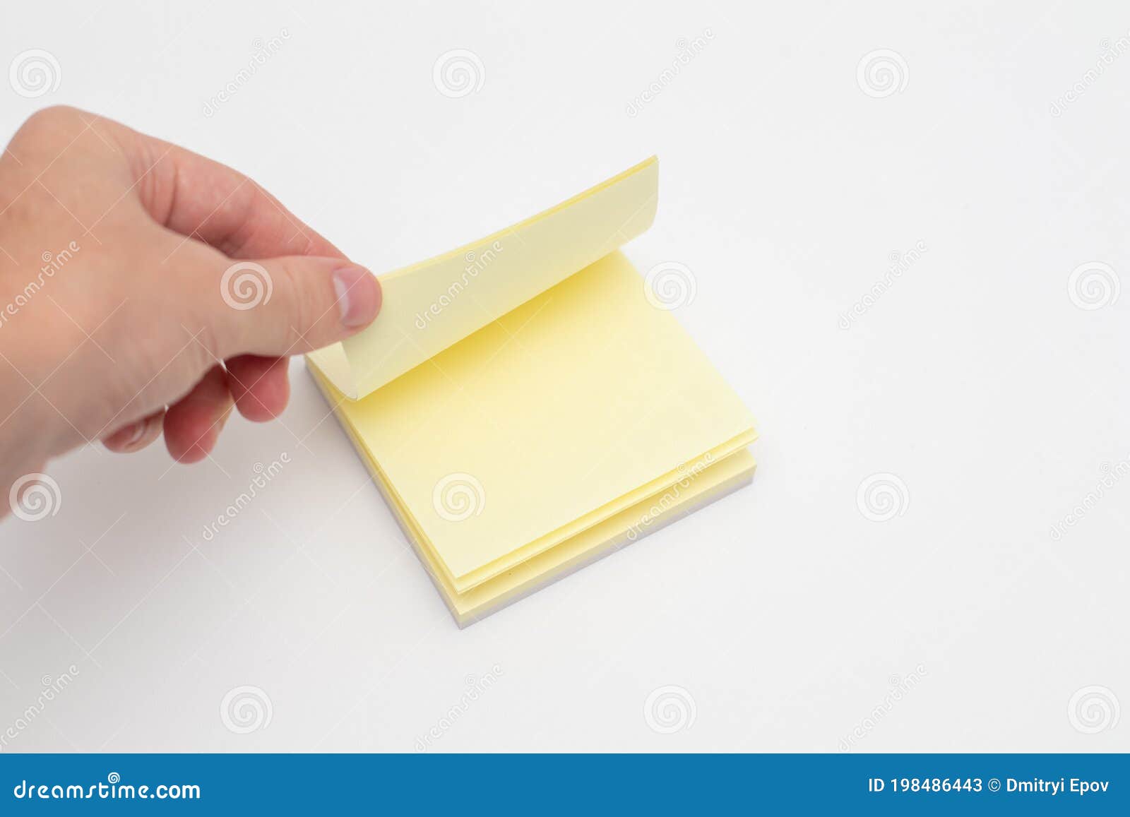 Hand Takes a Sticker from a Stack of Colored Stickers Stock Image ...