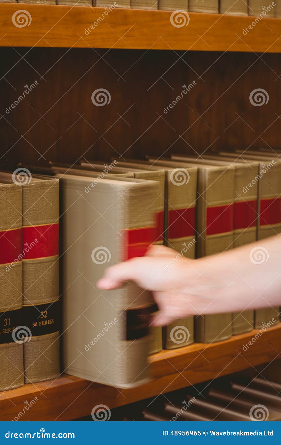 Hand Taking a Book from Bookshelf Stock Image - Image of shelf ...
