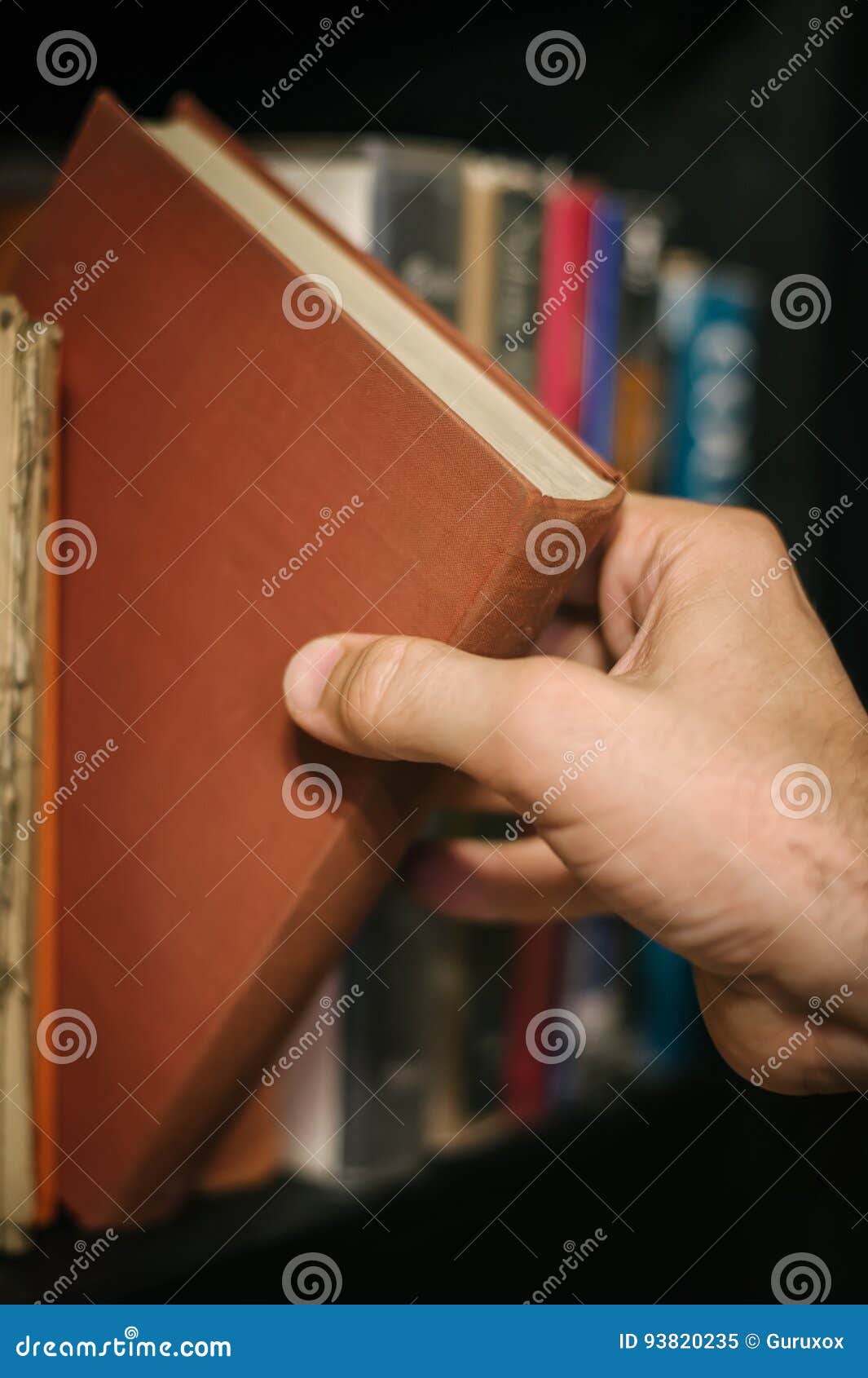 Hand Taking Book from the Shelf Stock Image - Image of looking, college ...