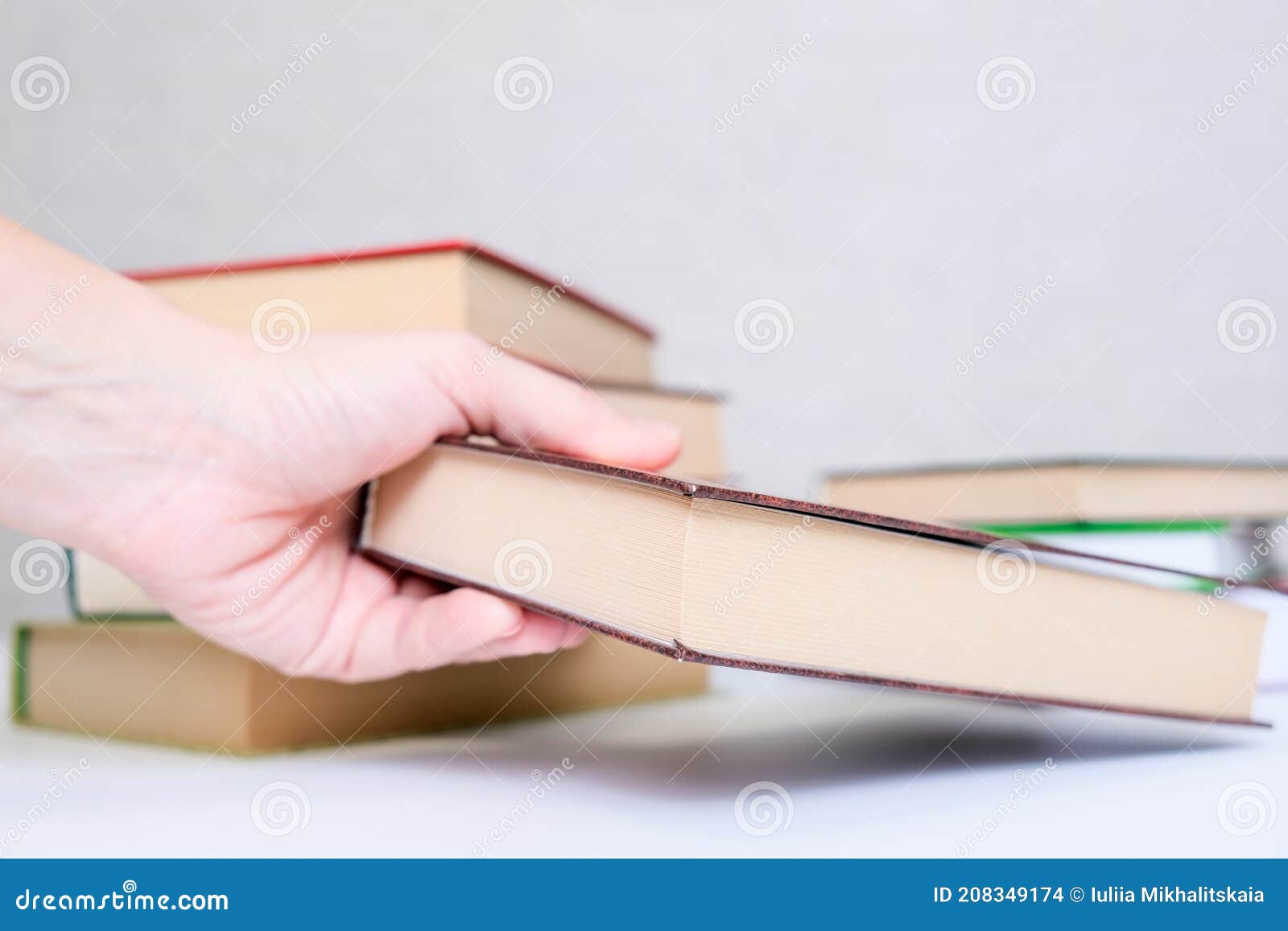 Man Selecting Books From Bookshelf In A Library Royalty-Free Stock ... Man Selecting Books From Bookshelf In A Library Royalty-Free Stock ...