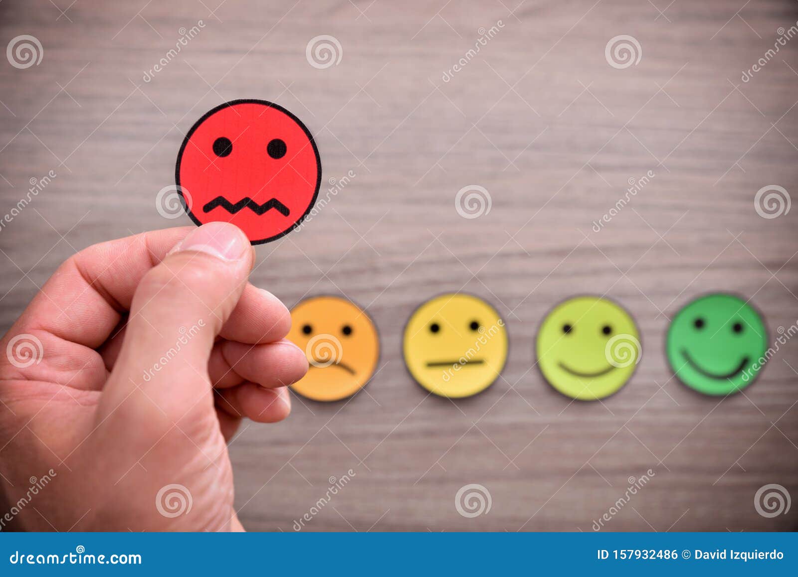 Hand Taking a Negative Assessment on Wood Table Top Stock Photo - Image ...