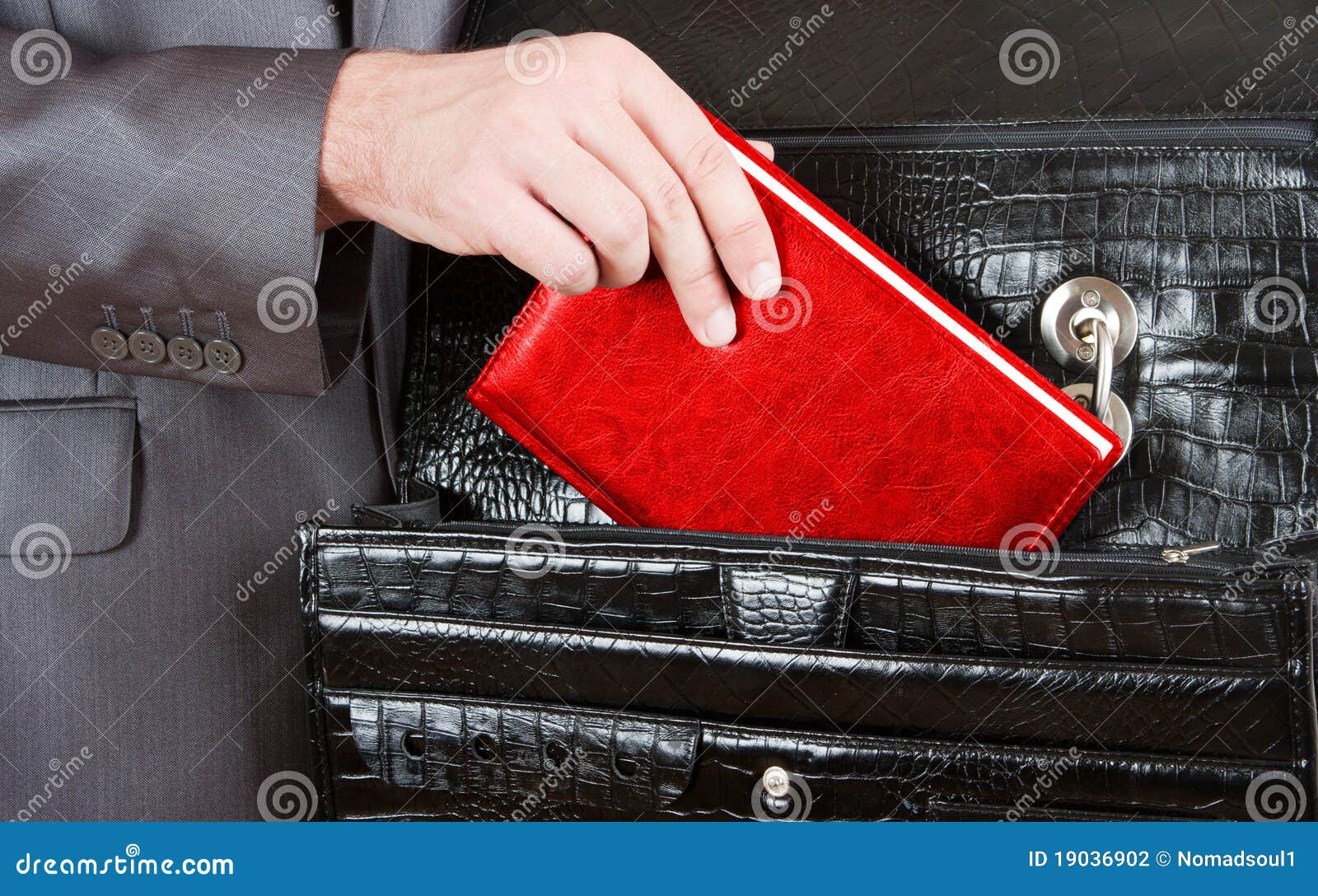 Hand Taking Red Organizer from Briefcase Stock Photo - Image of hand ...