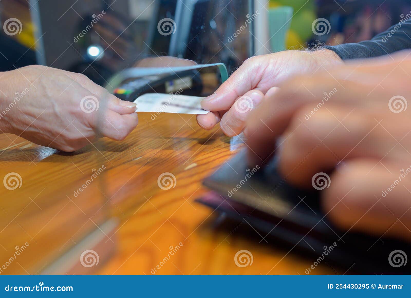 Hand taking ticket stock image. Image of establishment - 254430295