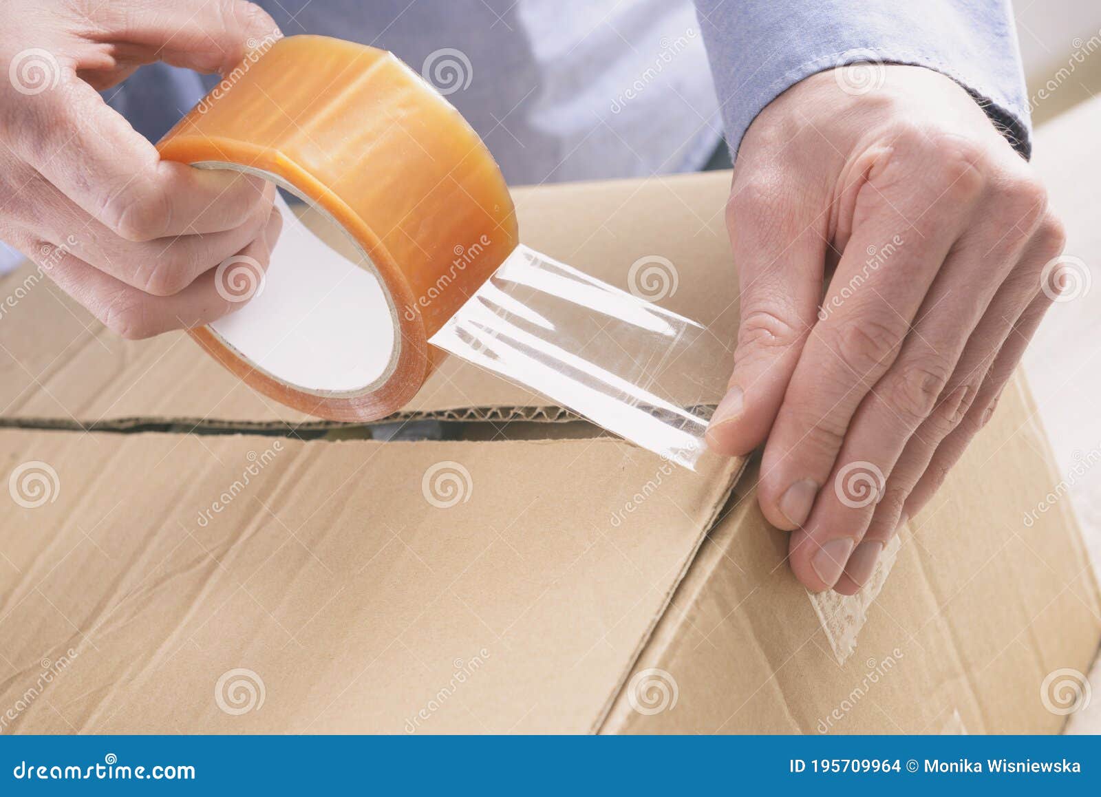 Hand Taping the Cardboard Box Stock Photo - Image of cardboard ...