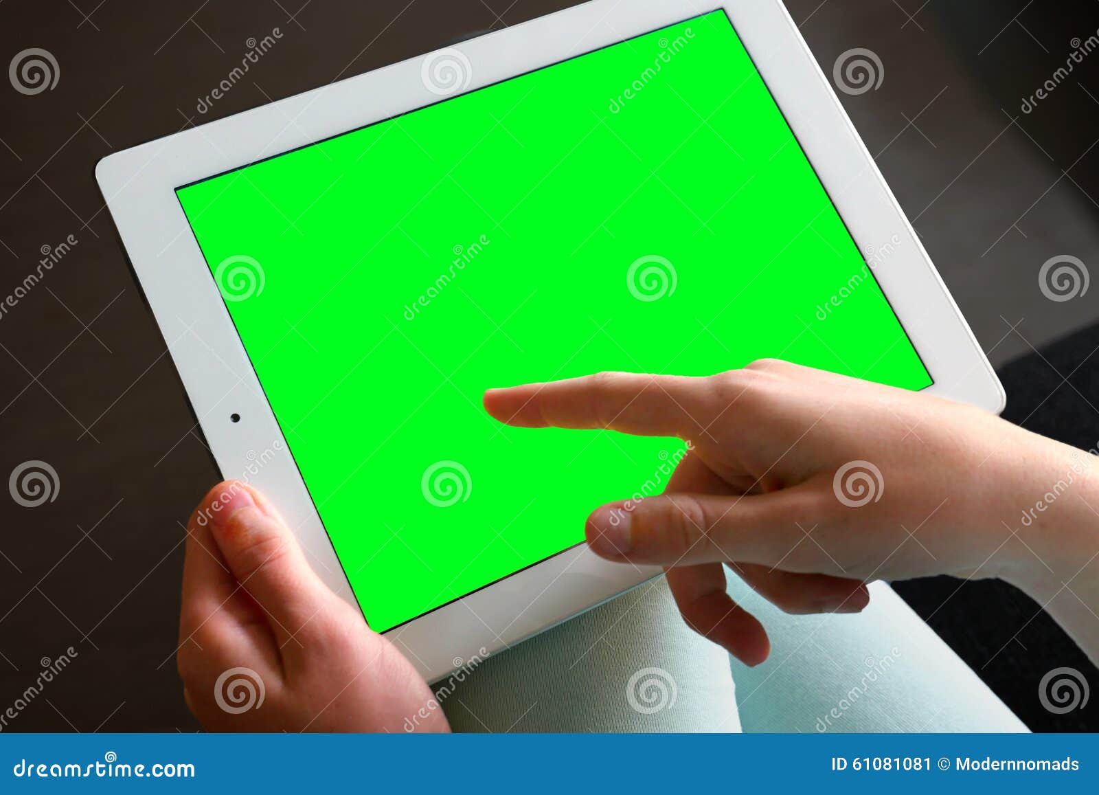 Hand tapping on screen stock image. Image of grenscreen - 61081081