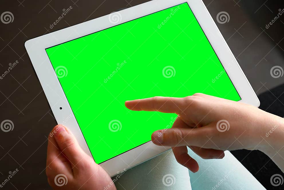 Hand tapping on screen stock image. Image of grenscreen - 61081081