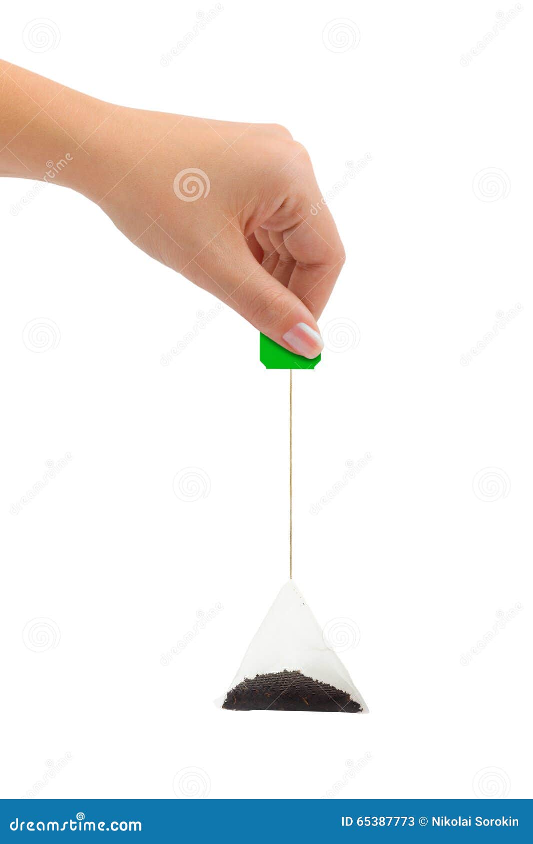 Hand and tea bag stock image. Image of pyramid, boiling - 65387773