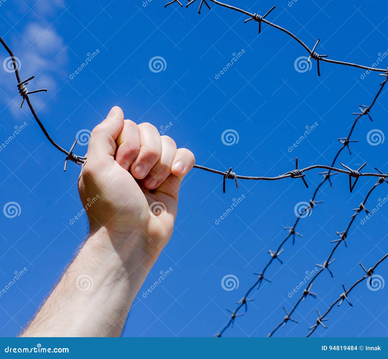 Hand is Tearing Wire Against the Blue Sky Stock Photo - Image of ...