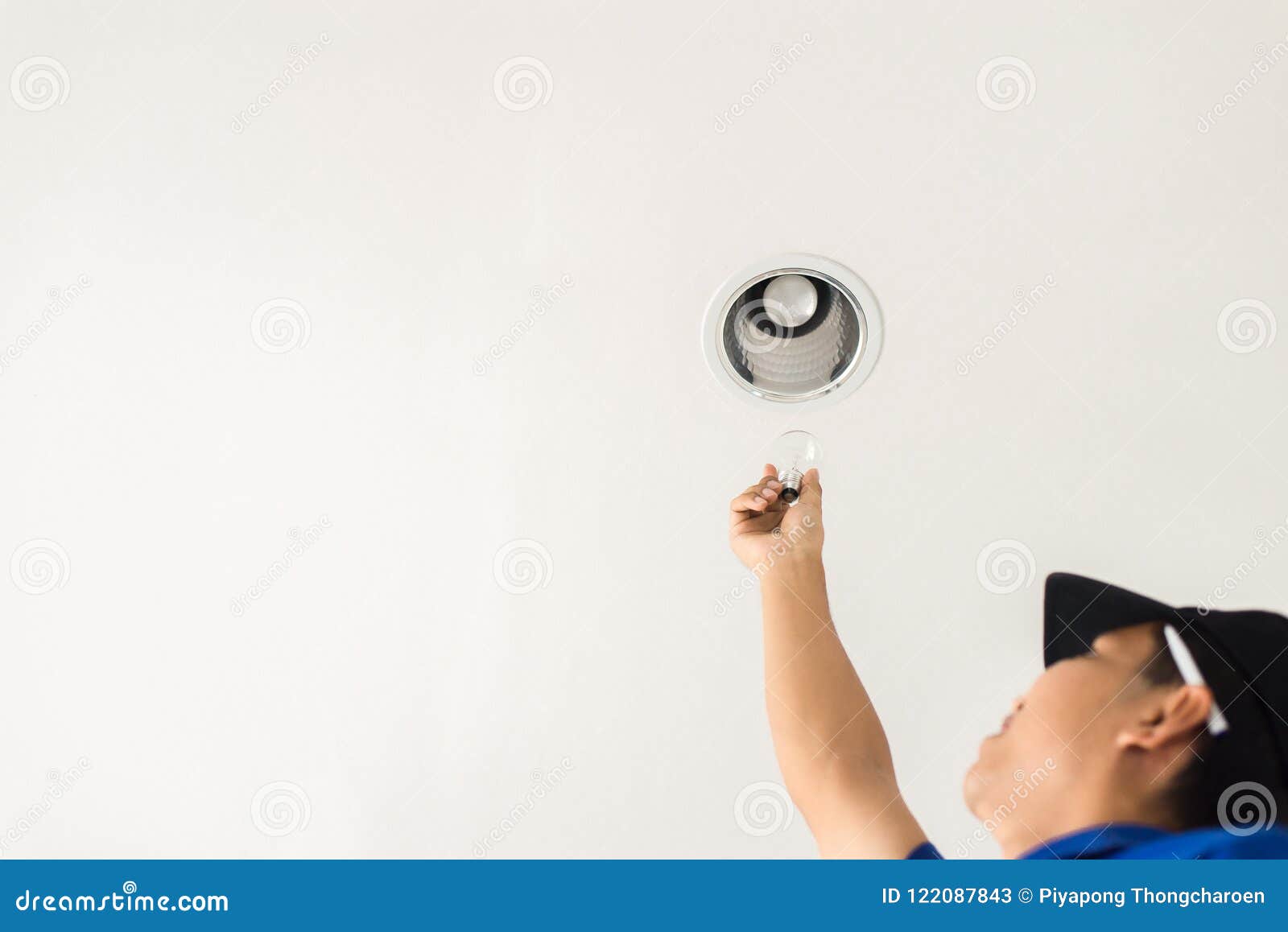 Hand Technician Changing with New LED Lamp Light Bulb,Power Saving ...