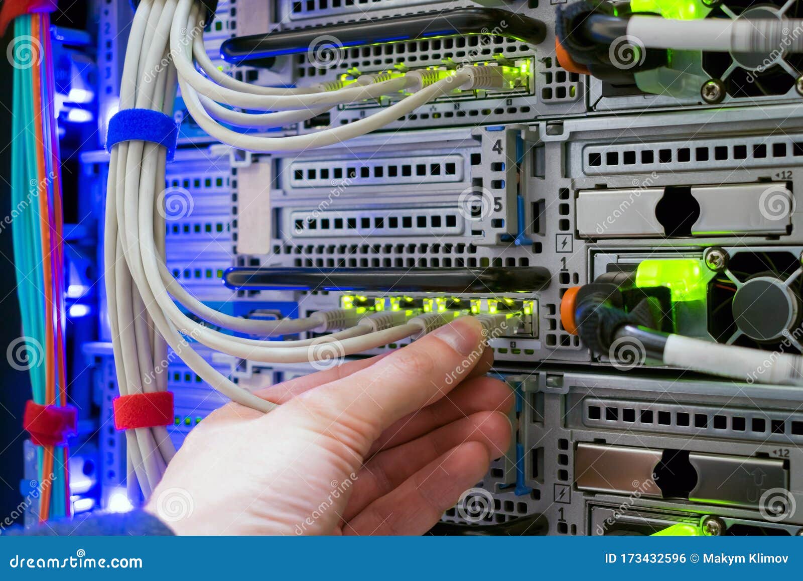 The Hand of a Technician with a Communication Internet Wire is a Close ...