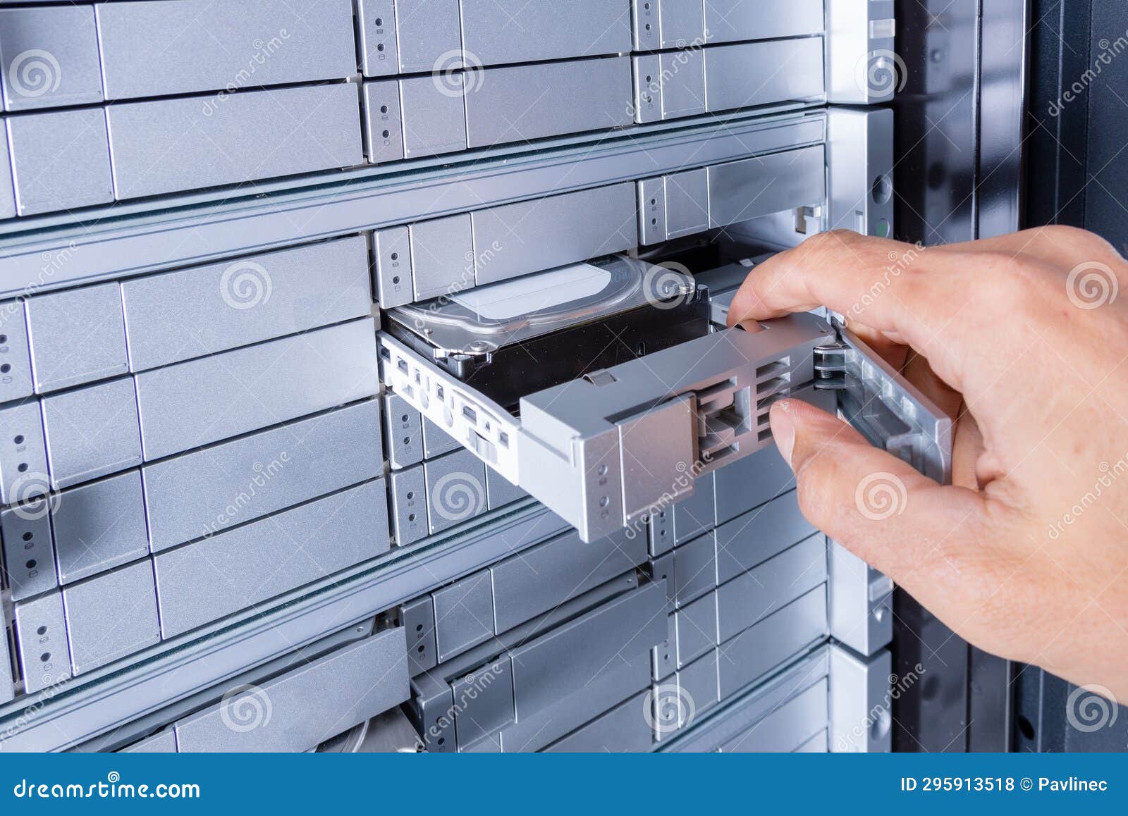 Hand of a Technician Exchanging Hard Drive with SAS Interface in Stock ...