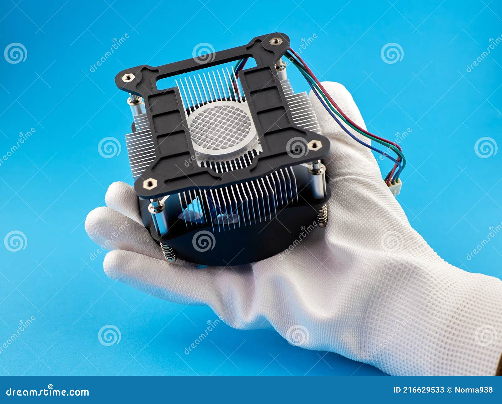 The Hand of the Technician is Holding PC CPU Cooler. PC CPU Cooler with ...