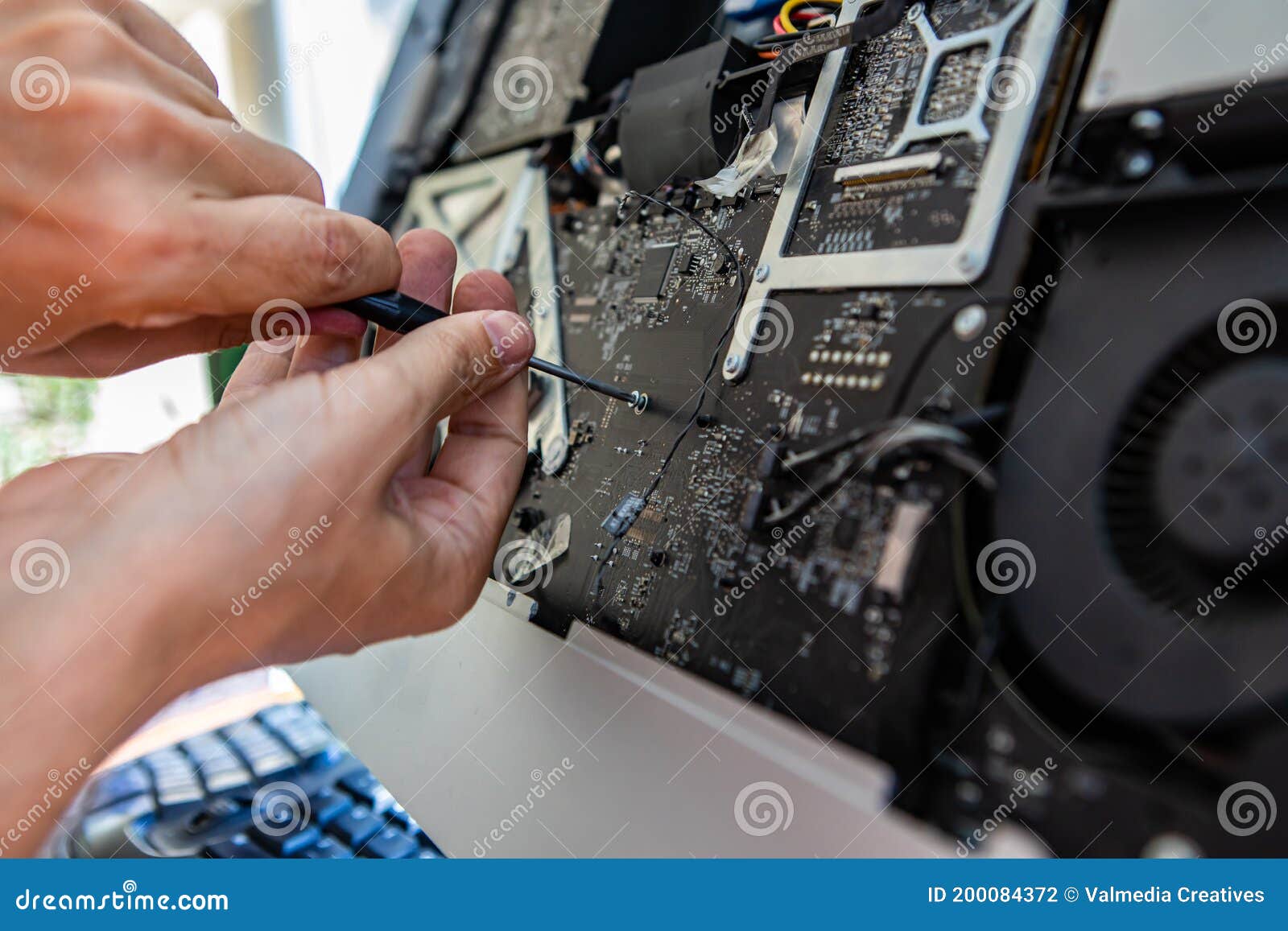 Hand of Technician Unscrewing Bolt in Desktop Stock Photo - Image of ...
