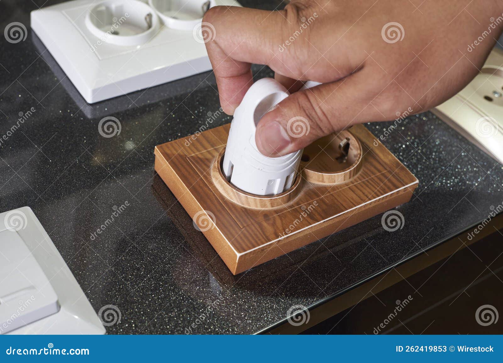 Hand Testing a Plug on a Double Socket in a Store Stock Image - Image ...