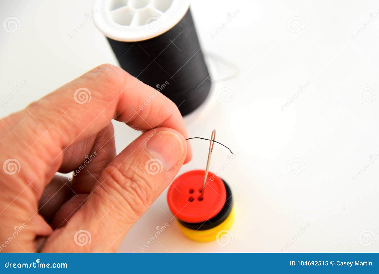 Hand Threading a Needle with Black Thread Stock Image - Image of person ...