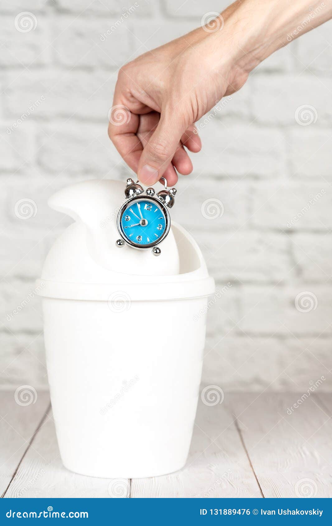 Hand Throwing a Clock into Litter Bin Stock Photo - Image of waste ...