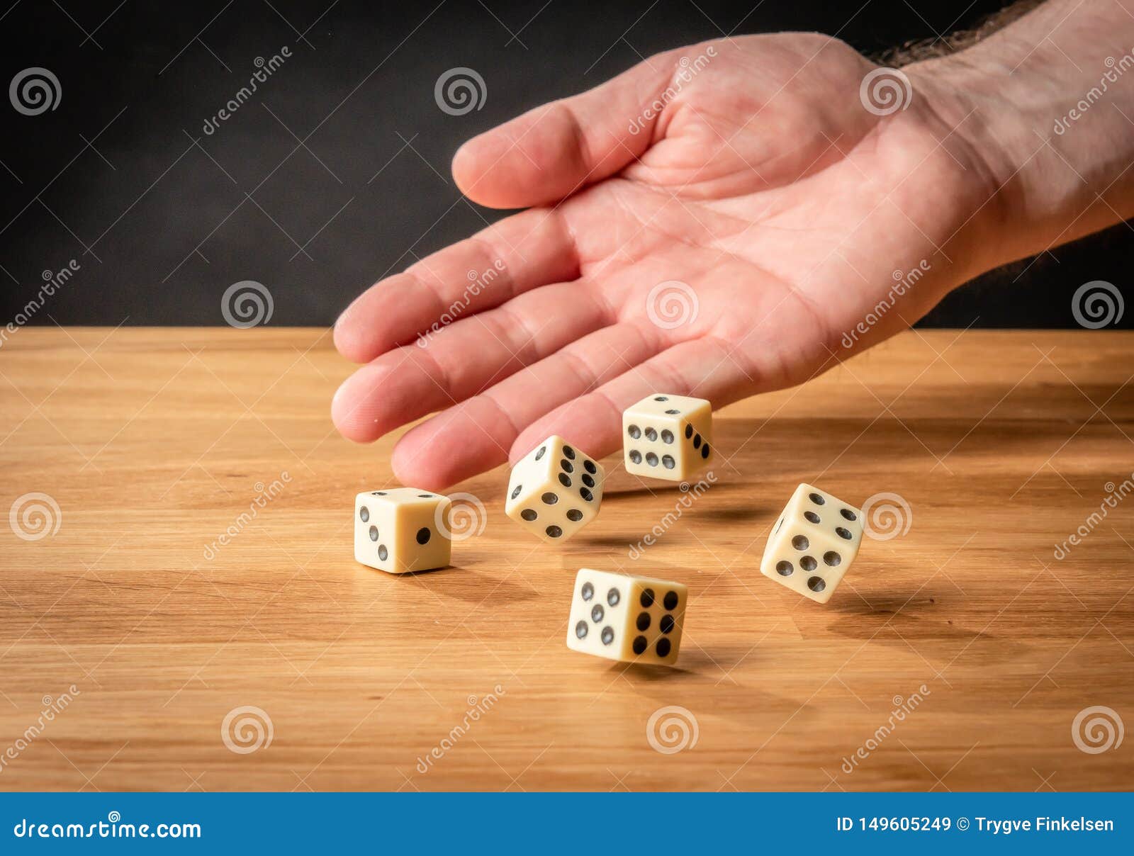 Man Is Throwing Dice On The Ludo And Team Playing Ludo Royalty-Free ...