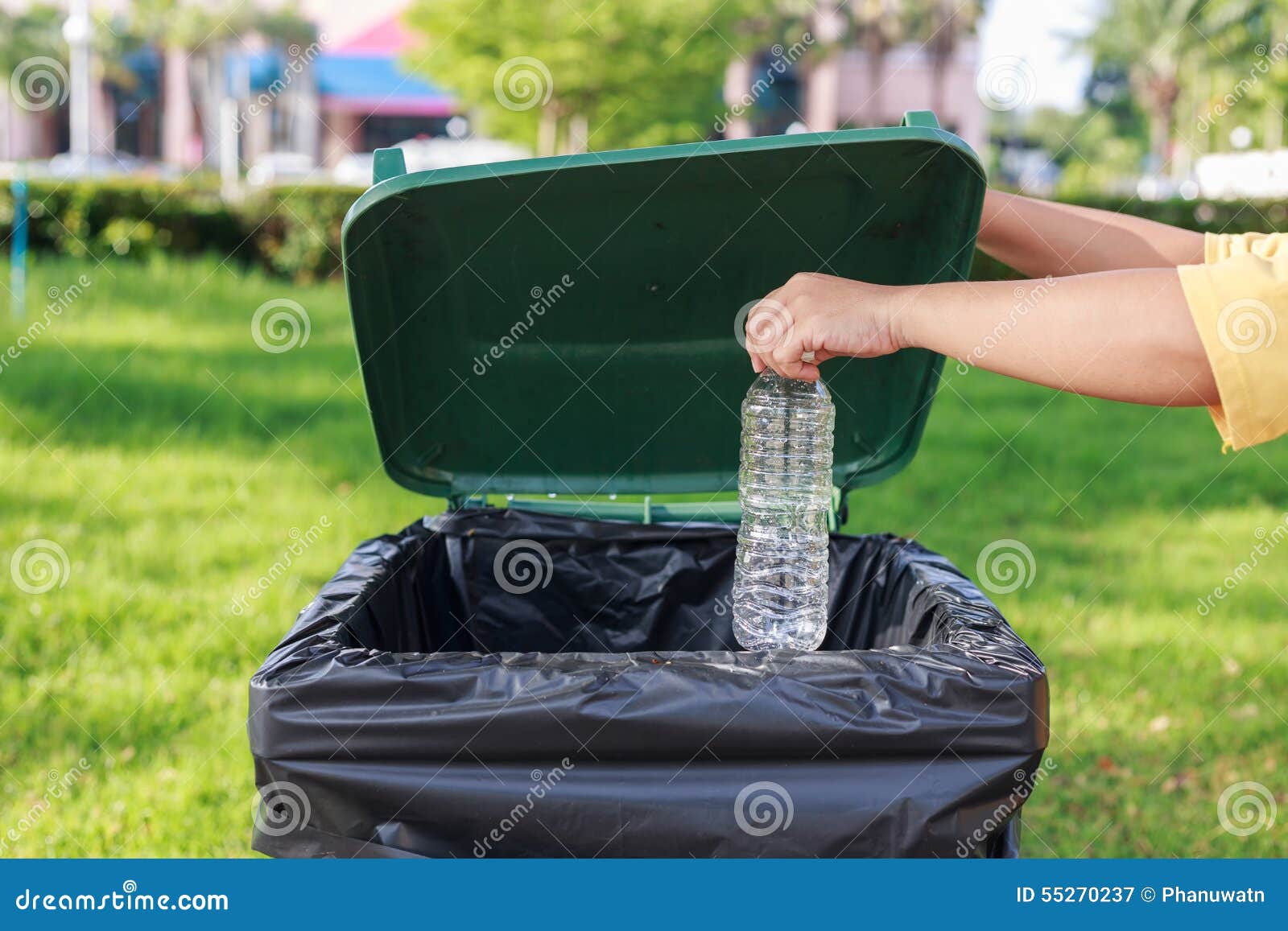 Hand Throwing Empty Plastic Bottle into the Trash Stock Image - Image ...