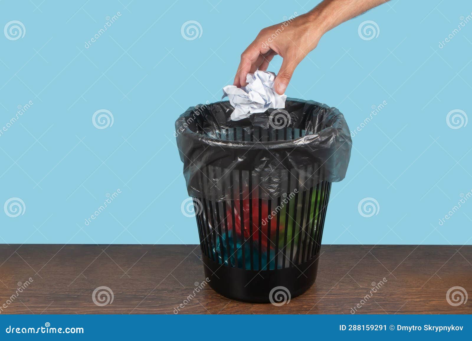 Hand Throwing Out Paper into a Trash Basket Stock Image - Image of ...
